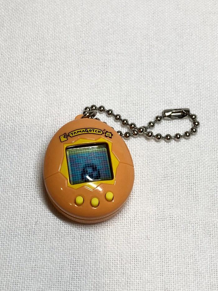 Game | Bandai | Tamagotchi Mini Peach Yellow